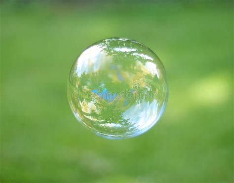 Bubble Reflection A Detailed Landscape Is Reflected In A Bubble