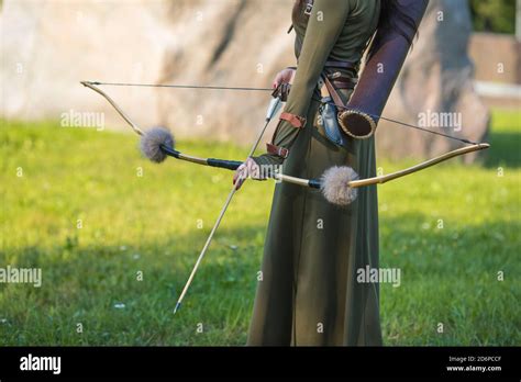 Close Up Female Hands With Bow And Arrow Stock Photo Alamy