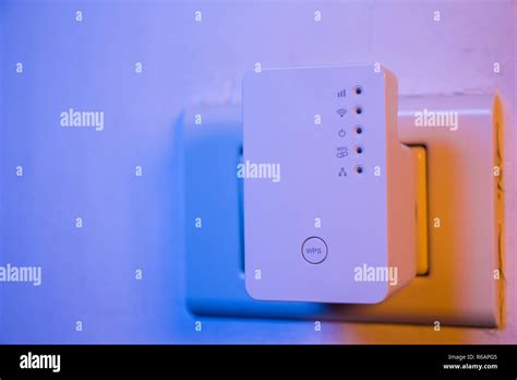 WiFi Repeater In Electrical Socket On The Wall Stock Photo Alamy