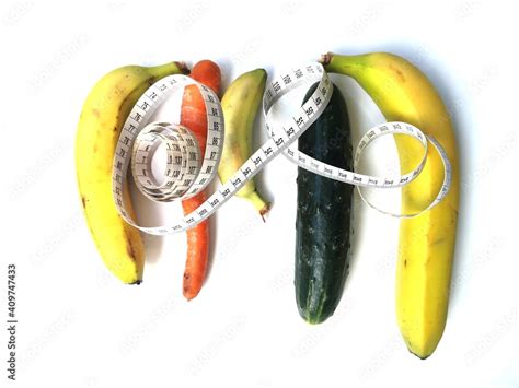 Measuring Tape With Bananas Carrot An Cucumber Symbolizing Different Penis Sizes And Forms