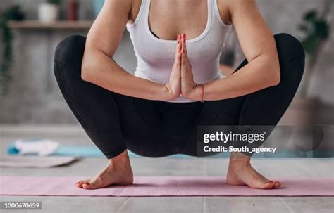 Woman Squat Yoga Photos And Premium High Res Pictures Getty Images