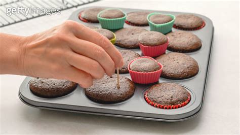 Chocolate Cupcakes Close Up On Baking Pan Chef Checking Cupcakes For