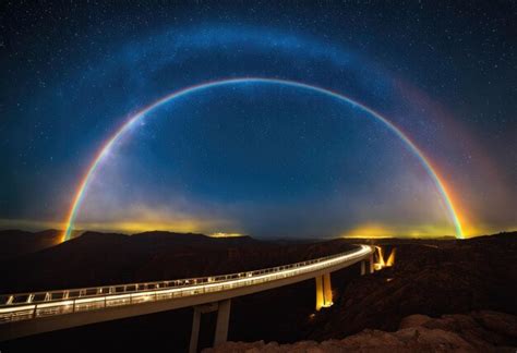 Premium Ai Image A Rainbow Bridge Connecting Two Distant Galaxies