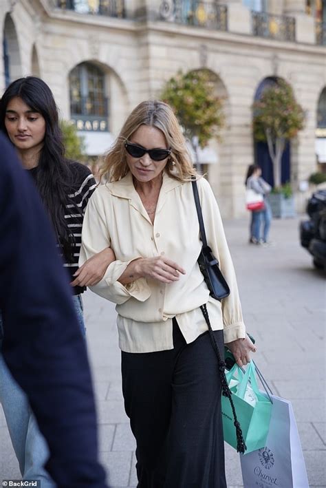 Kate Moss Goes Braless As She Rocks Cream Blouse While Daughter Lila