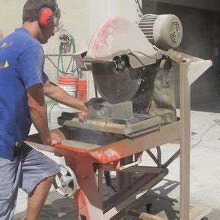 A Capping Of Grout Compression Specimens And B Compression Testing Download Scientific Diagram