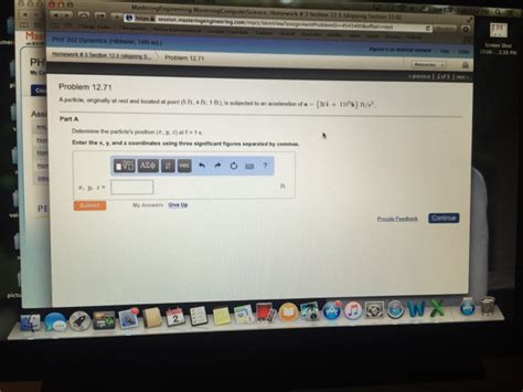 solved a particle originally at rest and located at point