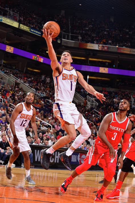 Devin Booker and Chris Paul by Barry Gossage
