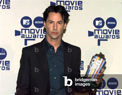 Image Of Actor Keanu Reeves Star Of The Film The Matrix Poses