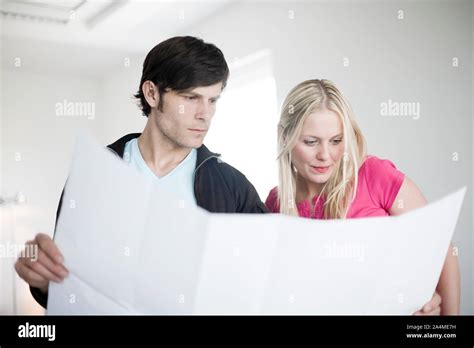 Couple With Construction Plan Life Planning Blueprint Planning Stock Photo Alamy