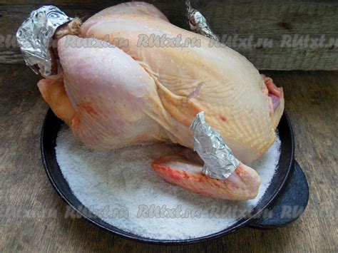 Рецепт курицы в духовке целиком на соли 7 фото в рецепте