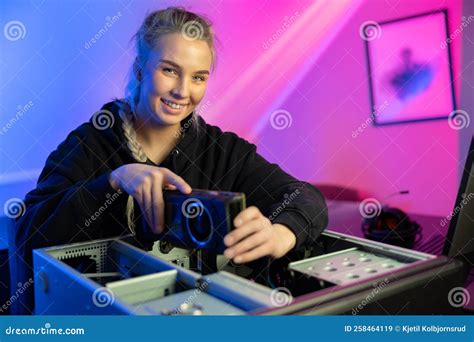 Smiling E Sport Gamer Girl Installing New Gpu Video Card In Her Gaming