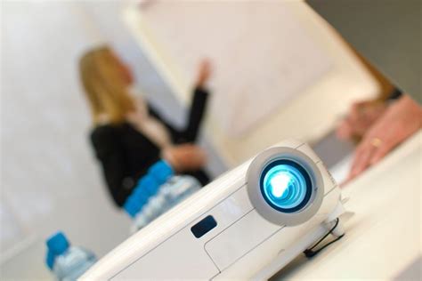why is my projector dim how can i fix this pointer clicker
