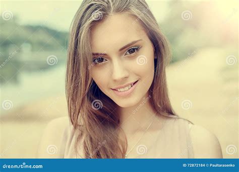 Portrait Of Beautiful Young Girl With Clean Skin And Pretty Face Stock
