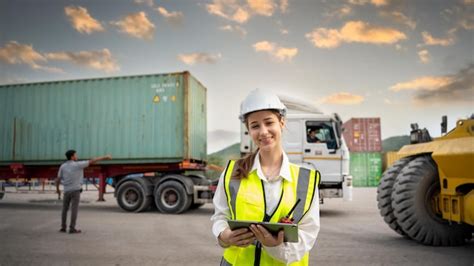 Premium Photo Woman Foreman Control Forklift Loading Containers Cargo From Truck To Port In