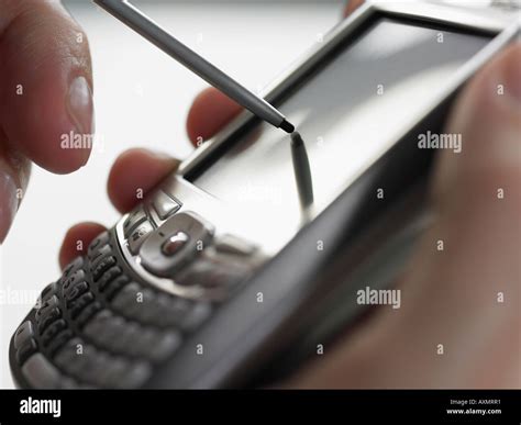 Man Using PDA Stock Photo Alamy