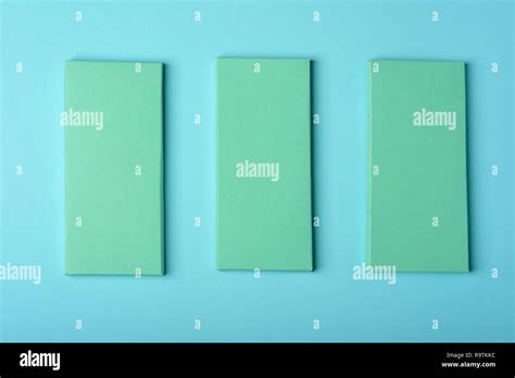Three Green Equal Rectangles On Blue Background Colorful Objects Cut Out Of Paper Fascinating