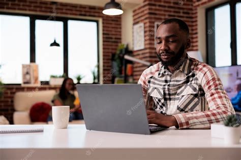 Premium Photo African American Programmer Writing Code Typing On Laptop Keyboard While