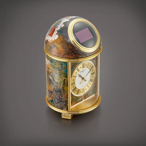 Une Page Dhistoire Reference 1350m A Unique Gilt Brass Solar Powered Dome Table Clock With