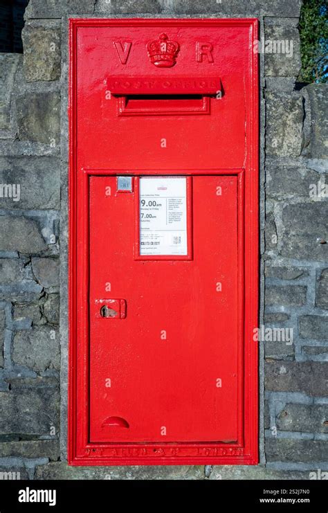 Red Victorian Wall Mounted Post Box Situated Outside Haworth Station