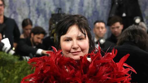 Lena Dunham Stuns In Bright Red Valentino Gown At 2026 Met Gala After 7