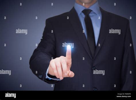 business, technology, internet and networking concept - businessman pressing button with contact ...