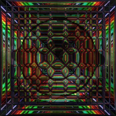 An Abstract Image With Many Colors And Shapes In The Center As Well As