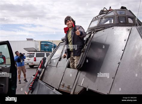 A Storm Chaser Pops Out Of Sean Caseys Tornado Intercept Vehicle An