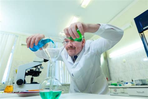 Chemist Crazy A Mad Scientist Conducts Experiments In A Scientific Laboratory Stock Image