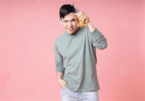 Photo Of Young Asian Man Drinking Alcohol On Background 43240905 Stock