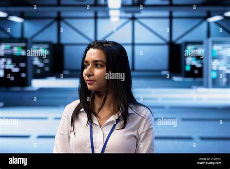 Manager Overseeing Server Room Walking Around Troubleshooting Infrastructure Components