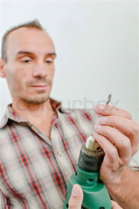 Man Holding Driller Colourbox