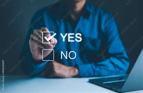 Decision Making With Yes Or No Choice Checkbox A Hand Selecting Yes