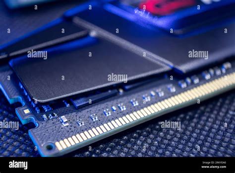 Memory Module DDR DRAM With Electrical Contacts In Blue Light Computer RAM Chipset Close Up