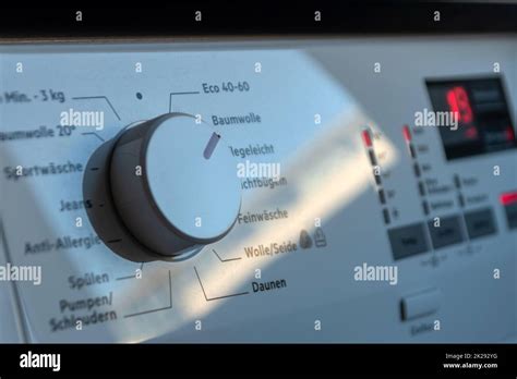 detail view of washing machine control panel with contemporary