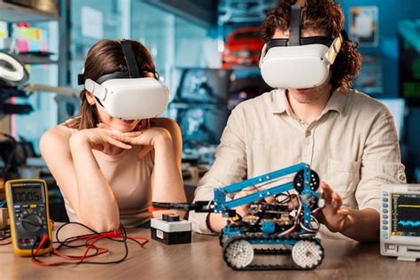 Premium Photo Young Man And Woman In Vr Glasses Doing Experiments In