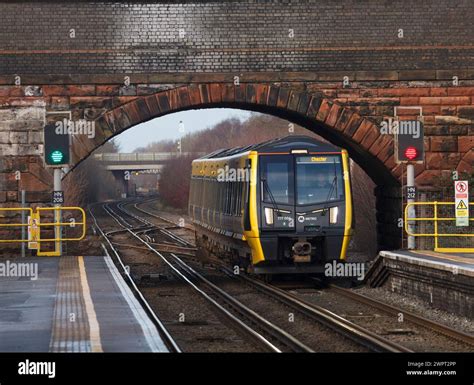 Merseyrail Stadler Class 777 Electric Train 777006 Arriving At Hooton