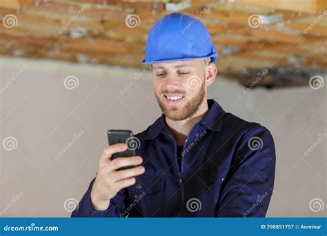 Male Engineer Holding Mobile Phone Stock Image Image Of Texts Builder