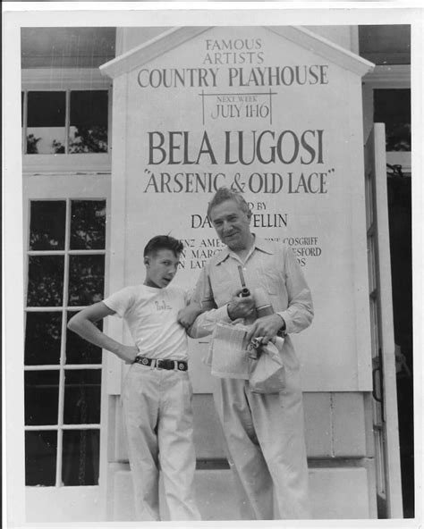 Béla Lugosi With His Son Bela Jr In Front Of An Ad For His Performance