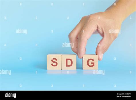 Sdg Or Sustainable Development Goals Concept Human Hand Stacking