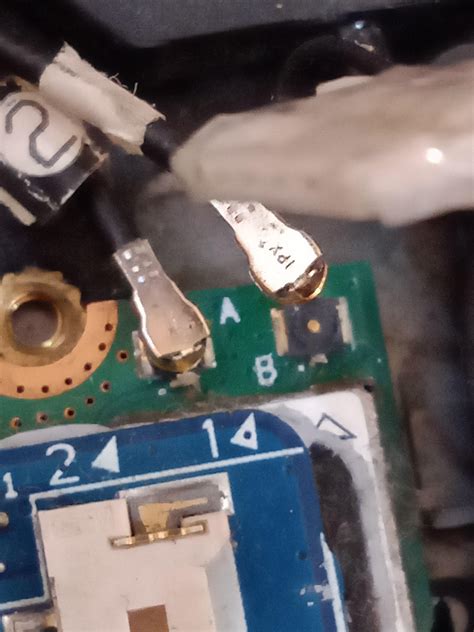 Is This Wifi Card Connector Broken I Am Not Able To Put It In Place Again I Did The A One But