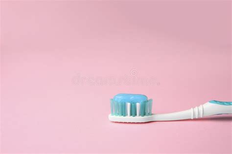 Brush And Toothpaste On Pink Background Stock Image Image Of Plastic