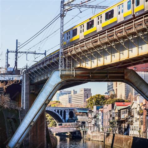Premium Photo Elevated Metro Train Bridge Above Canal