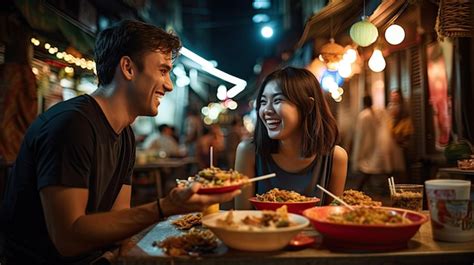 Premium Ai Image Young Asian Couple Traveler Tourists Eating Thai