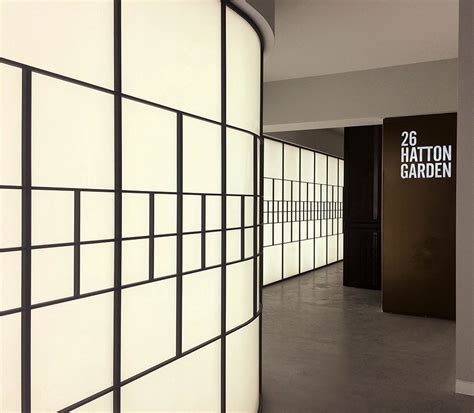 Backlit Glass Walls Curve Throughout Hatton Gardens Office Spanlite