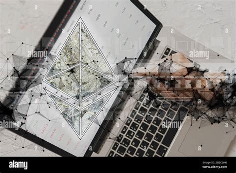 Crypto Currency Etherium Symbol While Using Computer Laptop Background