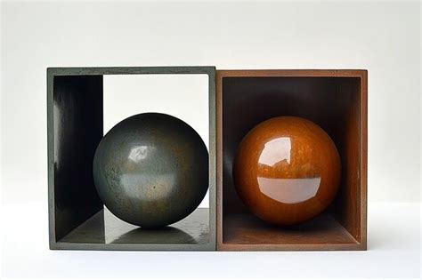 Abstract Cube And Sphere Shapes Sculpture Premium Ai Generated Image