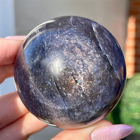 Iolite Sunstone Big Sphere With Cats Eye Flash And Confetti Aaa Iolite