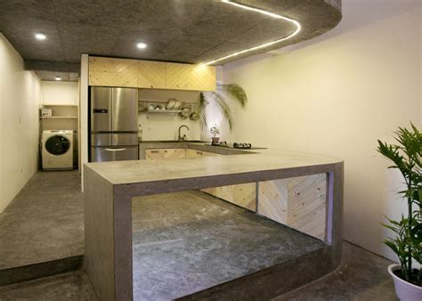 Perforated Brick Gable Screens Courtyard In Front Of Compact Hanoi House