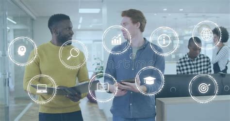 Animation Of Icon In Circles Over Diverse Coworkers Sharing Ideas While Walking In Office Stock