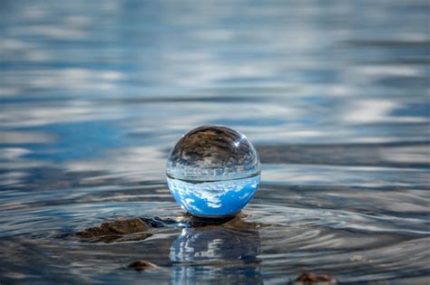 Premium Photo Close Up Of Crystal Ball On Water